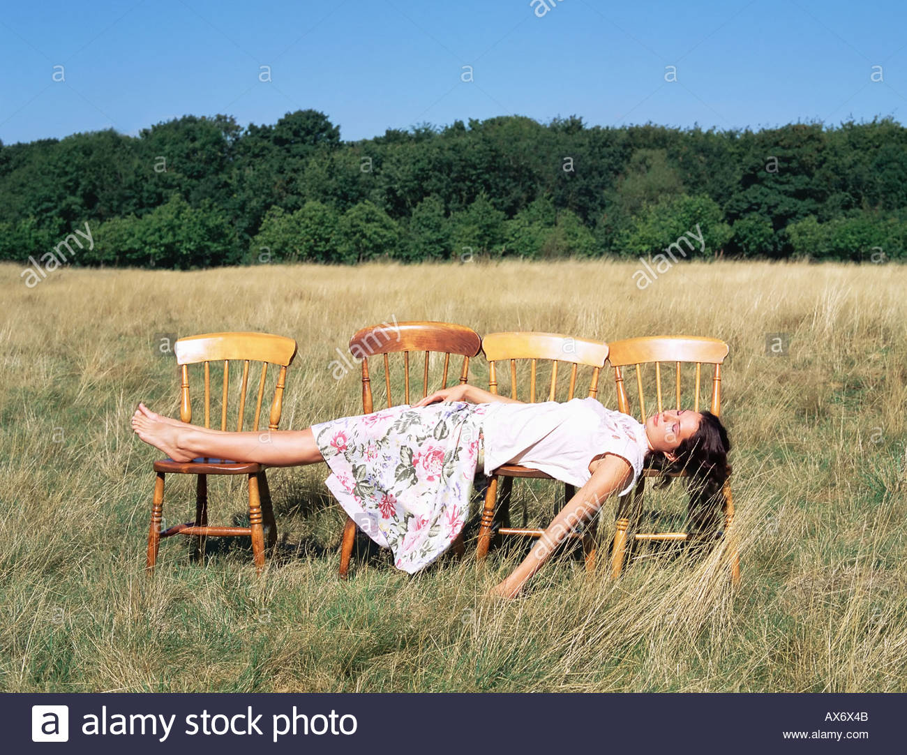 Woman Sleeping In Chair Stock Photos & Woman Sleeping In Chair Stock ...