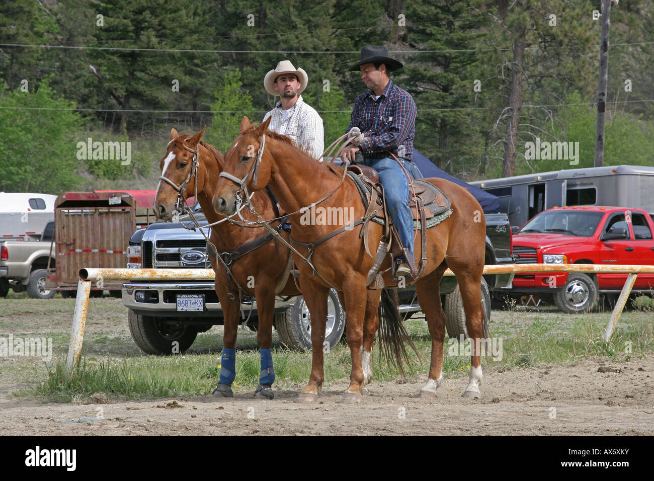 Two cowboys at a rodeo Stock Photo - Alamy