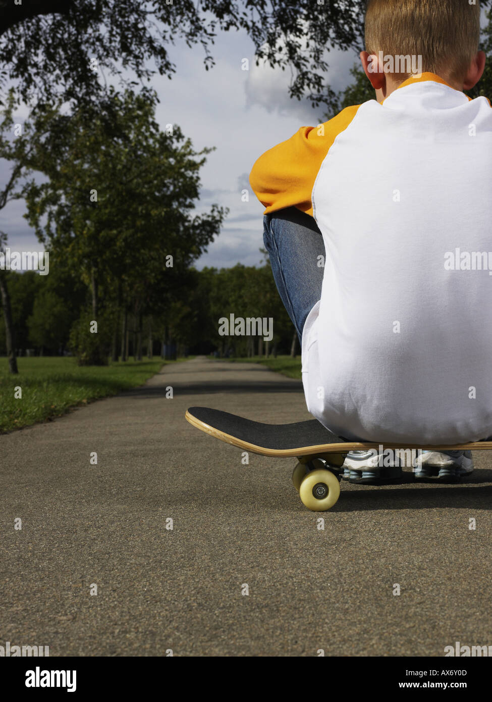 Young Boy On Skateboard High Resolution Stock Photography and Images ...
