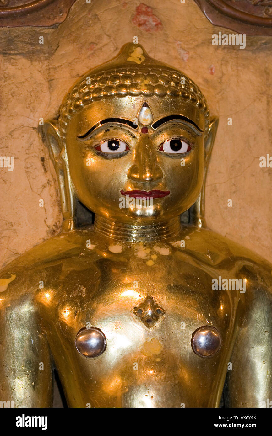 A golden Buddha statue in the Jain Temple of Jaisalmer Rajasthan India ...
