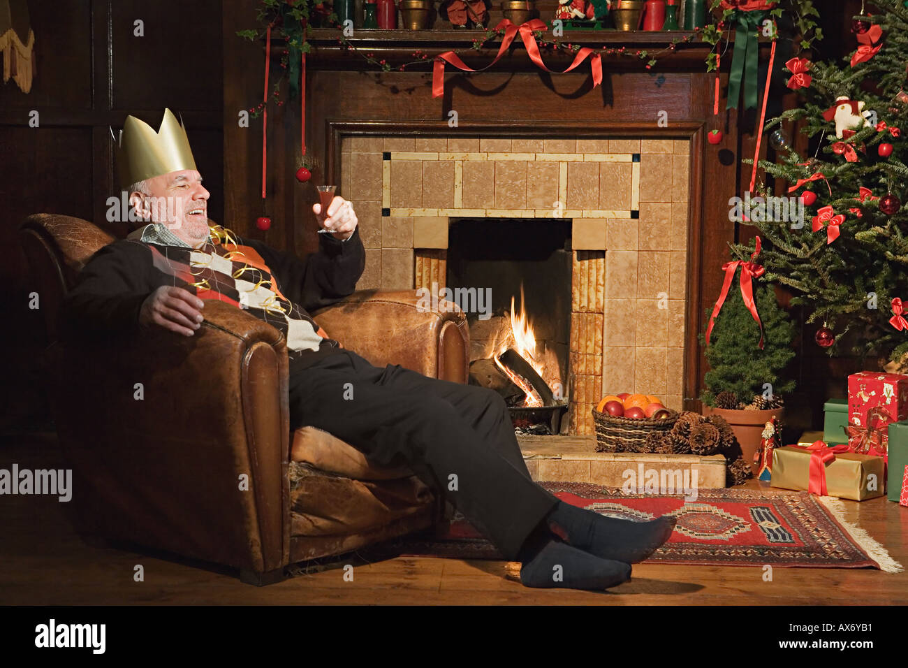 Man drinking sherry at christmas Stock Photo - Alamy