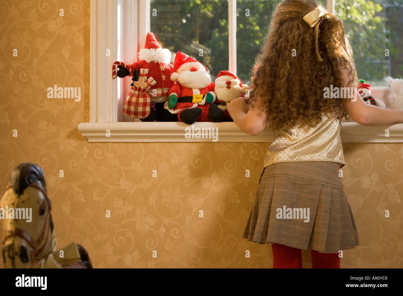 Girl waiting for santa claus Stock Photo - Alamy