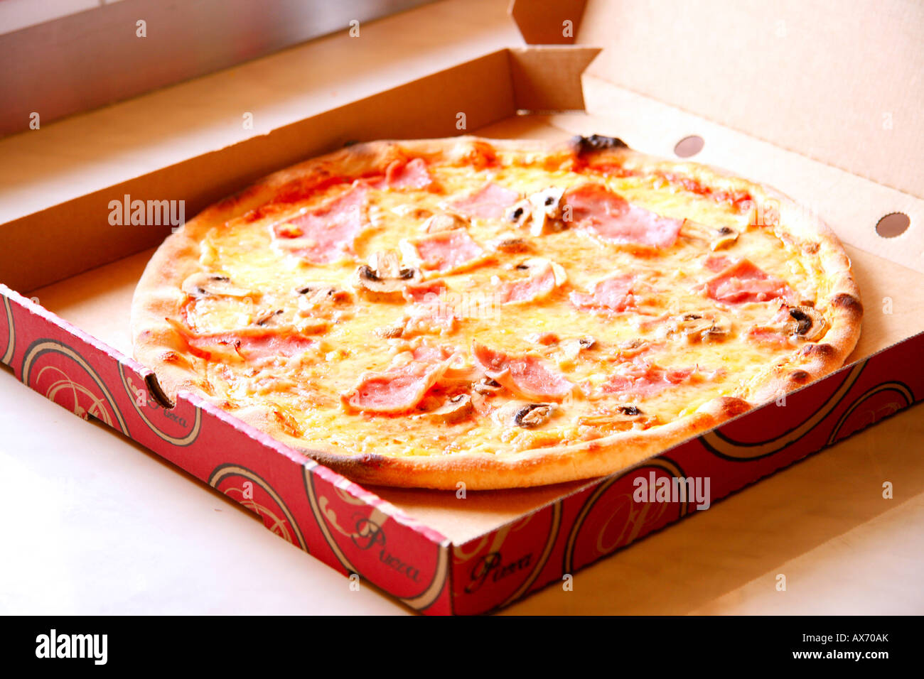 Italian pizza in to the box ready for delivery Stock Photo - Alamy