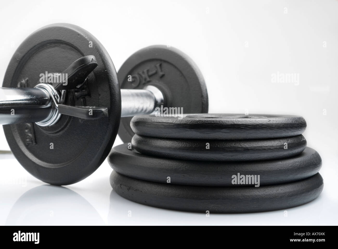 Stack of black weights on a white background Horizontal shot Stock ...