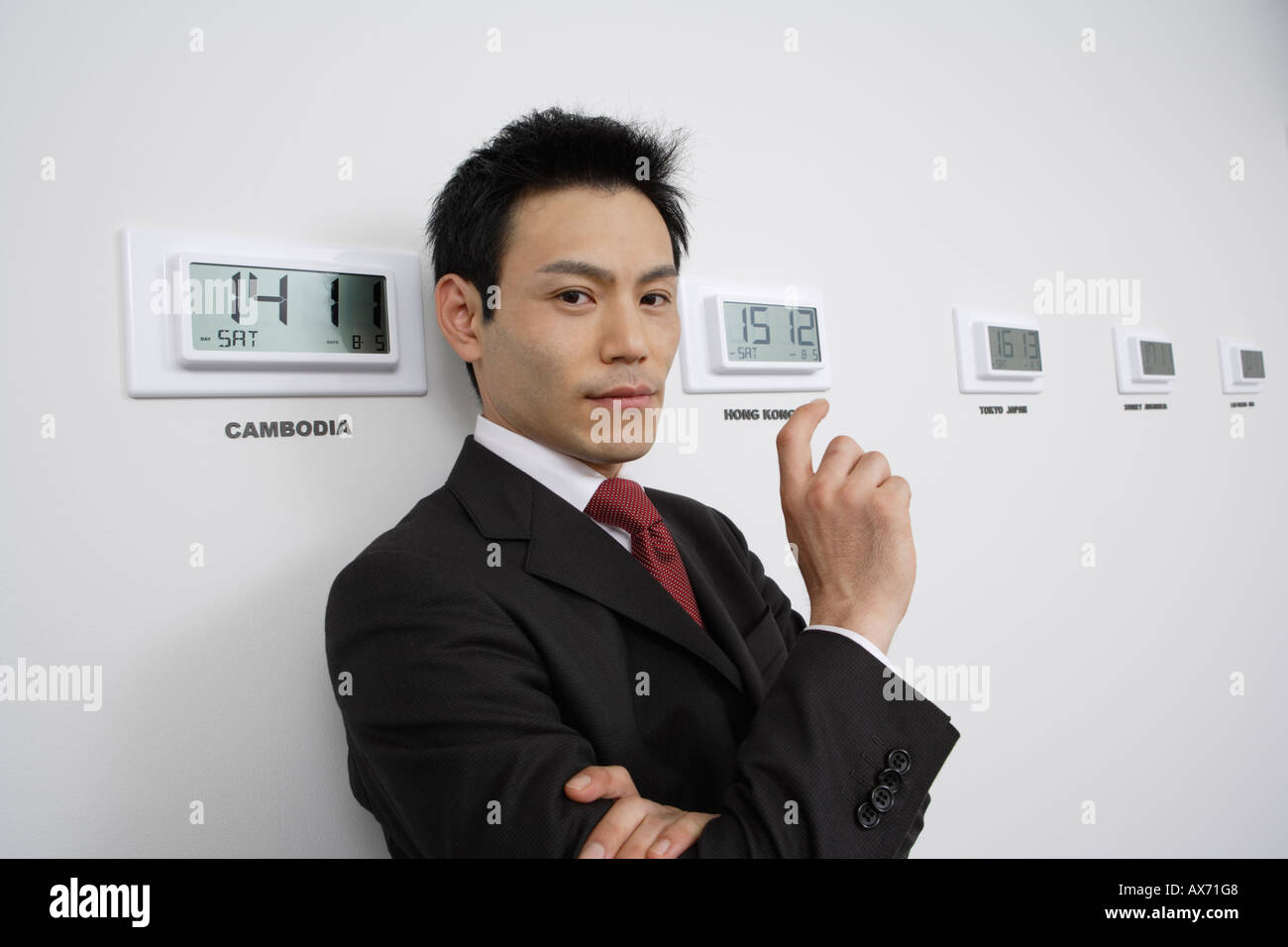 Businessman with time zones hi-res stock photography and images - Alamy