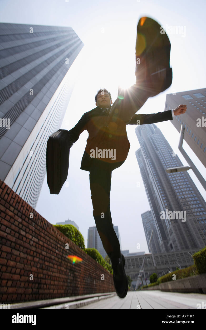 Man jumping happily hi-res stock photography and images - Alamy