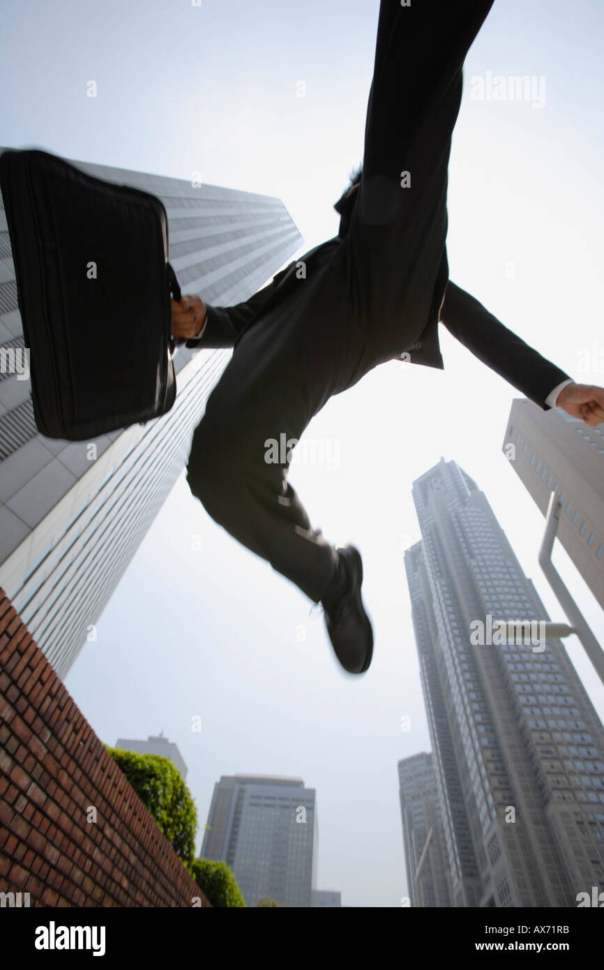 Man jumping happily hi-res stock photography and images - Alamy