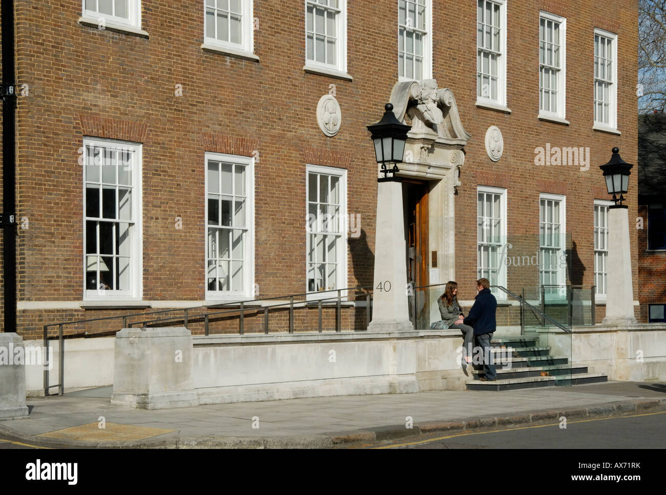Foundling Museum with friendly young couple on entrance steps ...