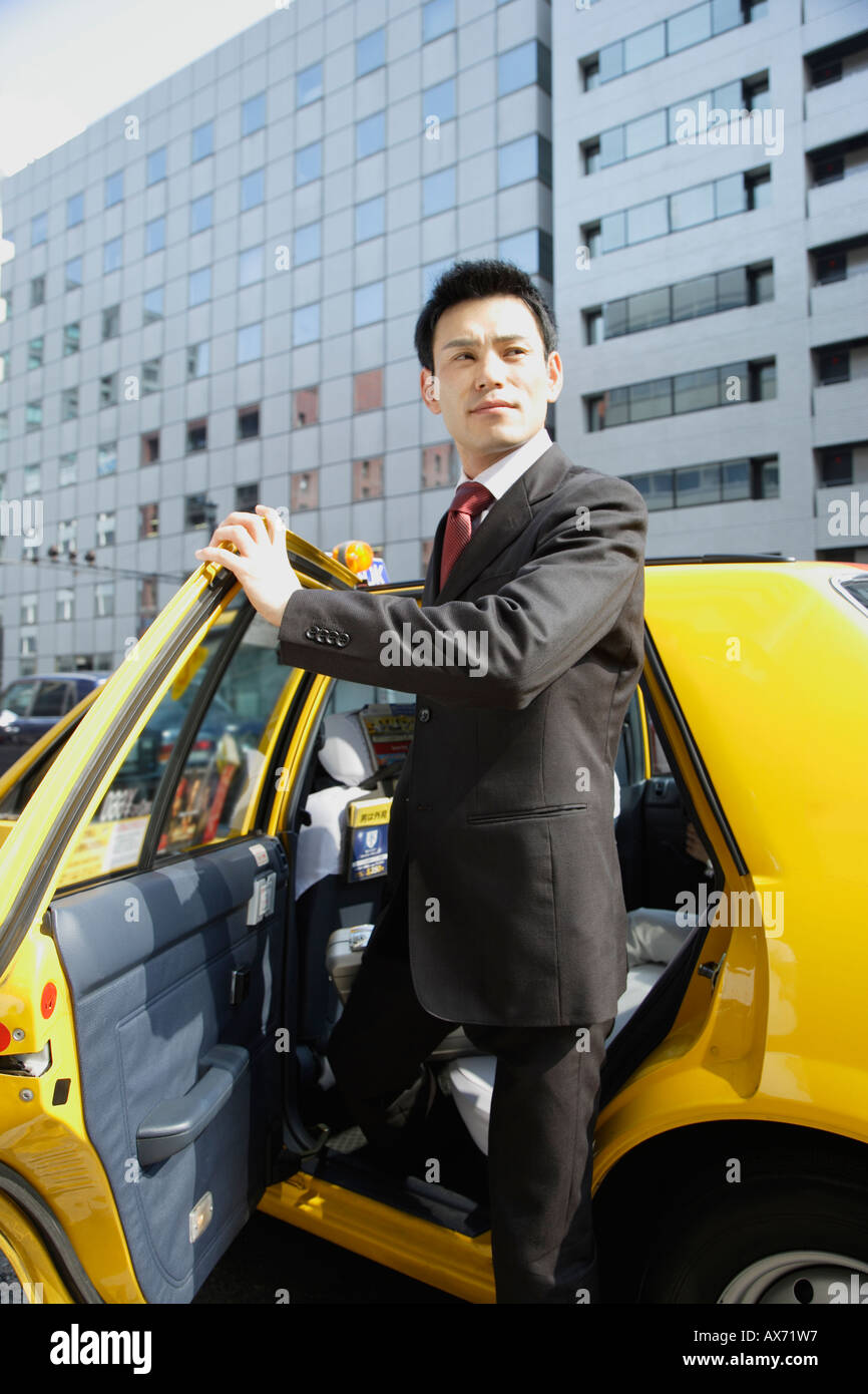 Guy Stepping Out Of Car