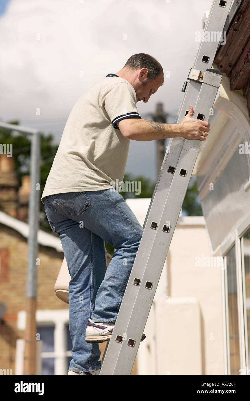 British window cleaner at work in London England UK Stock Photo - Alamy