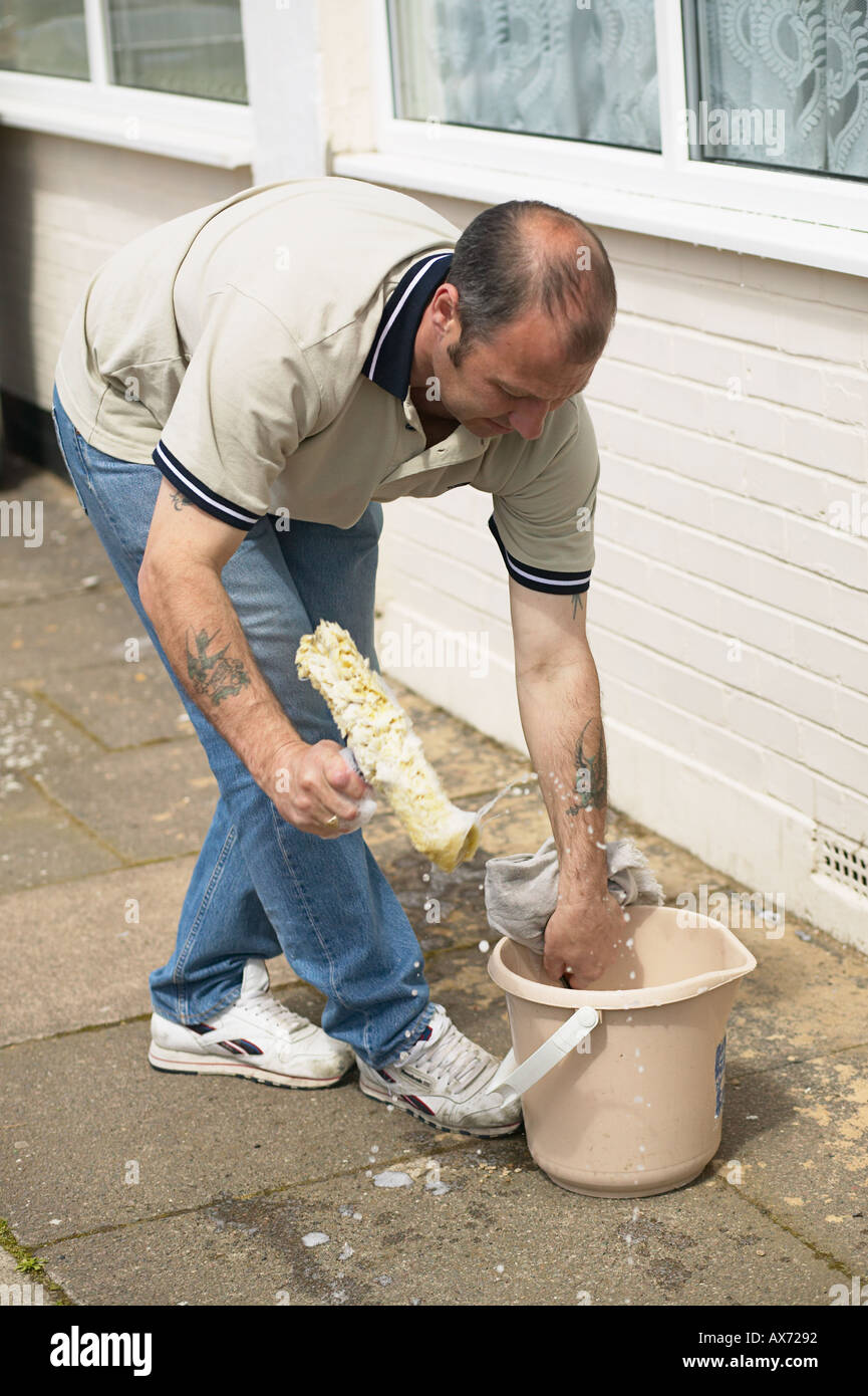British window cleaner at work in London England UK Stock Photo - Alamy