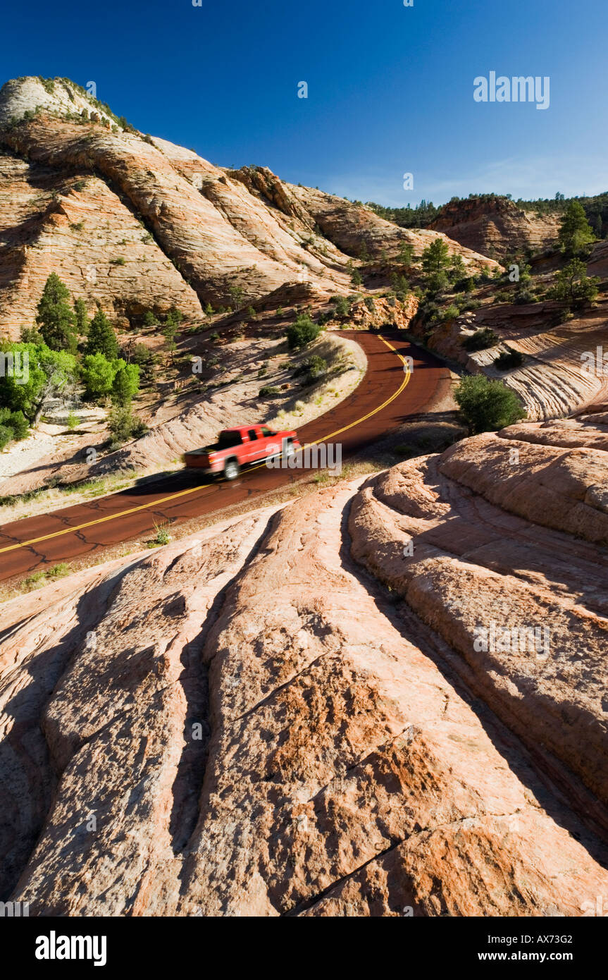Red SUV taking the curves, Zion National Park, Utah, USA Stock Photo ...
