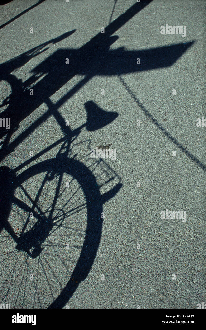 bicycle shadow on pavement Stock Photo - Alamy
