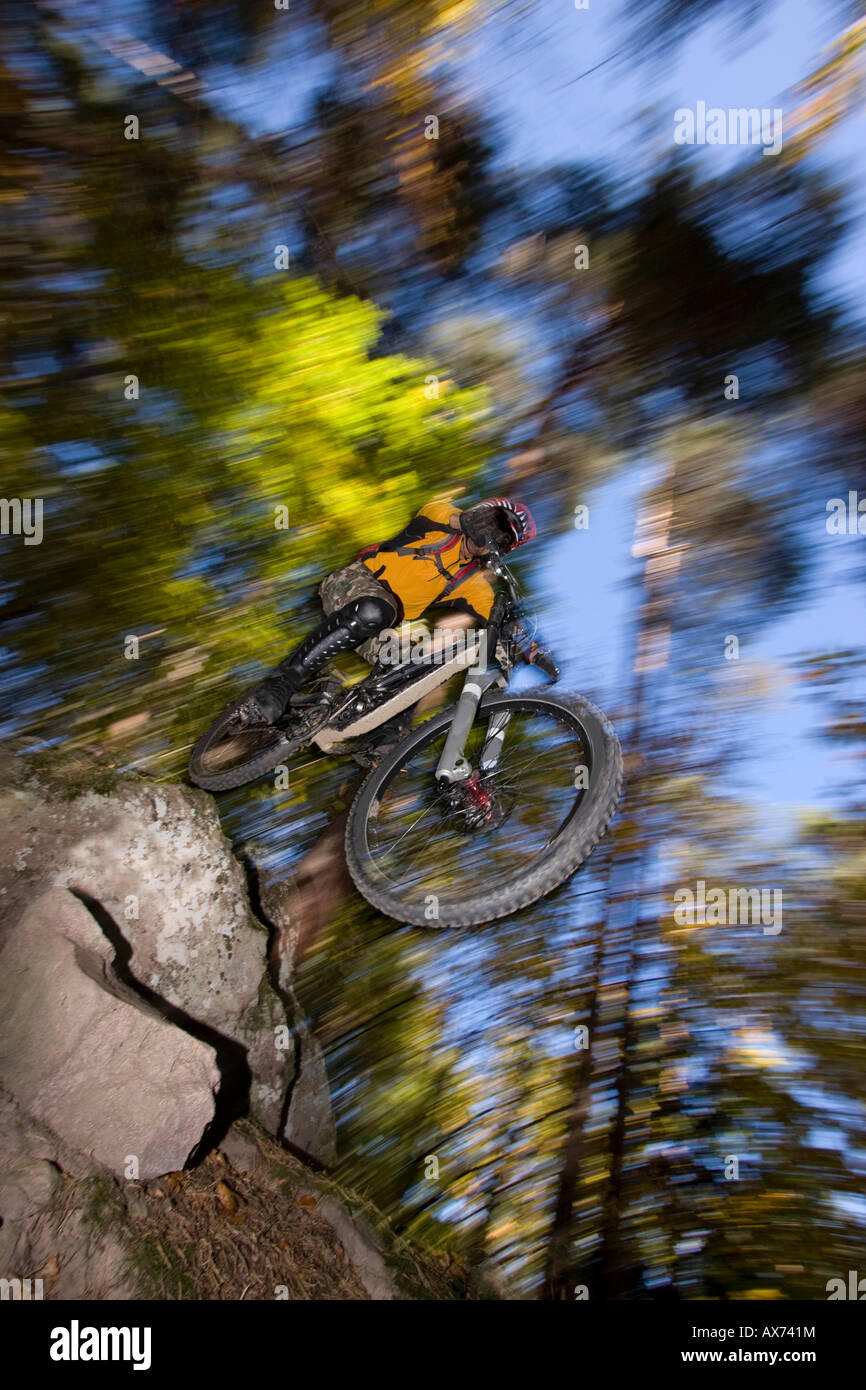 Italy, Southern Tyrol, man mountain biking Stock Photo - Alamy
