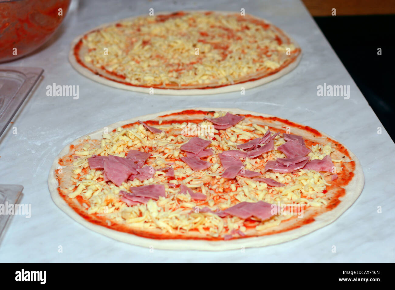 Making an italian pizza Stock Photo - Alamy
