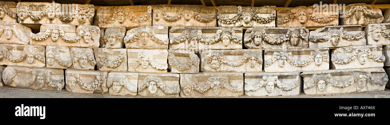 Wall of Carved Decorations. Panoramic of an archaeologists created a ...