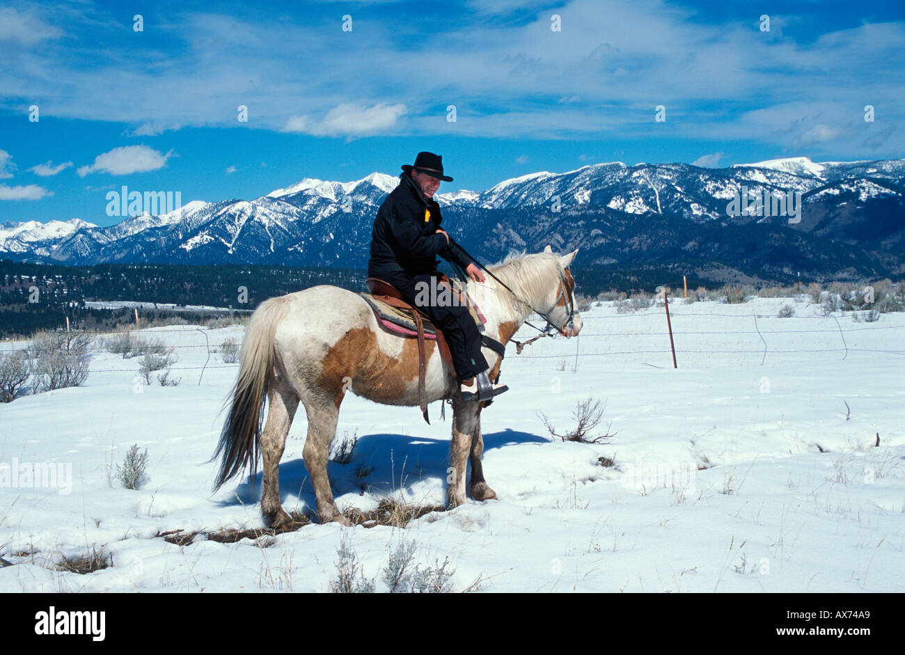 Horse riding western style in Montana Ski resort of Big Sky in the ...