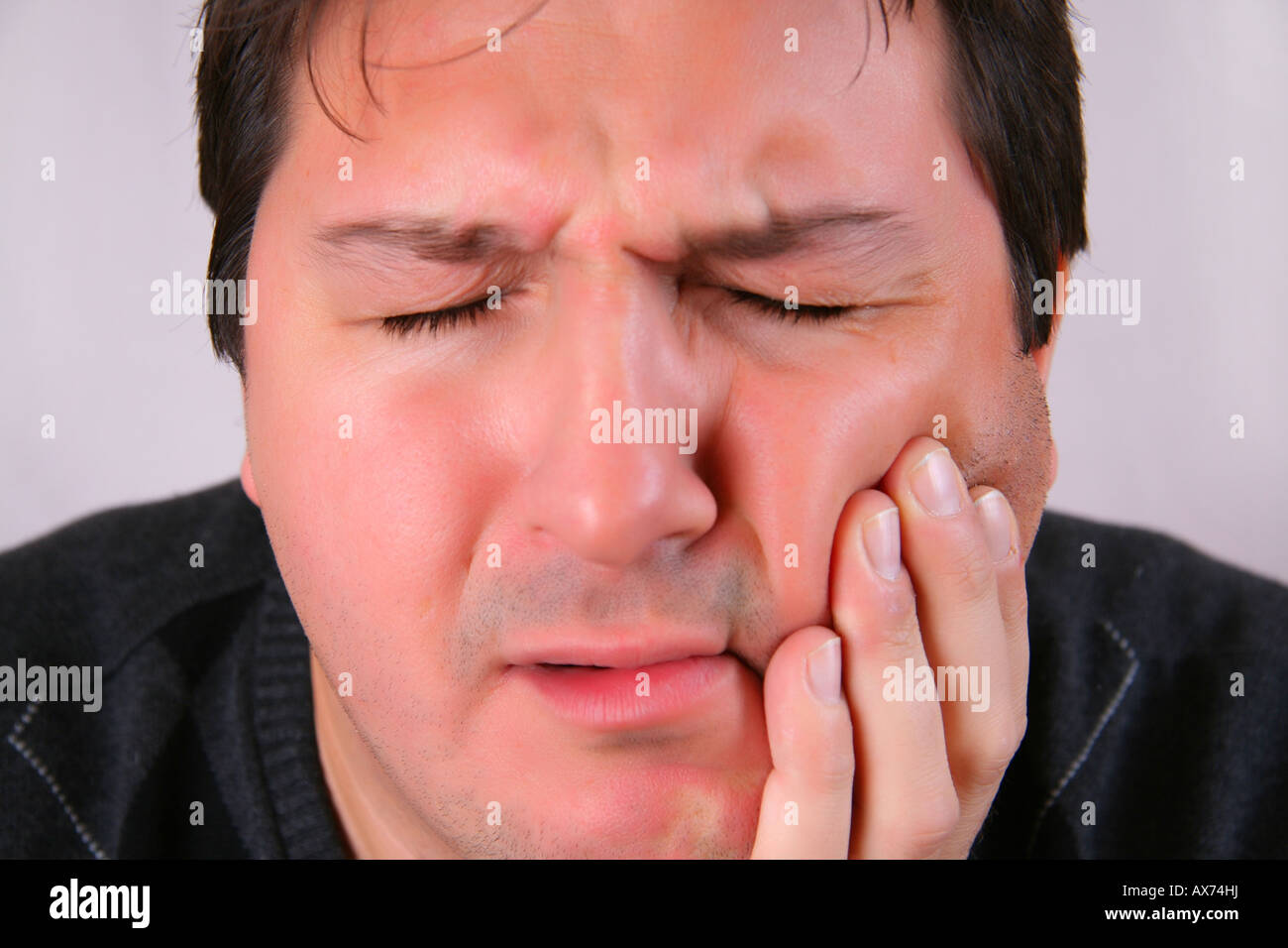 Toothache (man in agony Stock Photo - Alamy