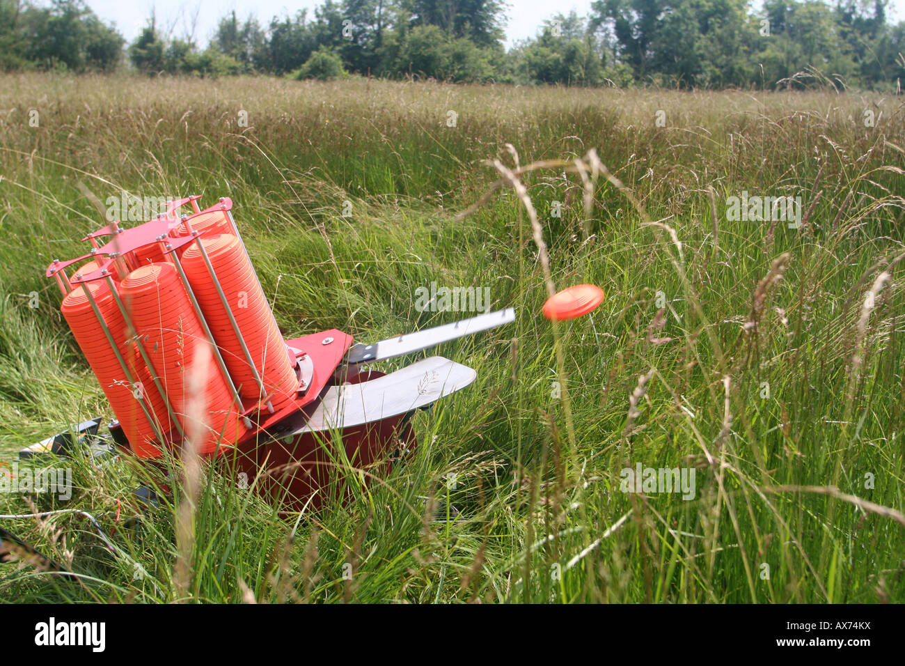 Clay pigeon launcher trap Stock Photo - Alamy