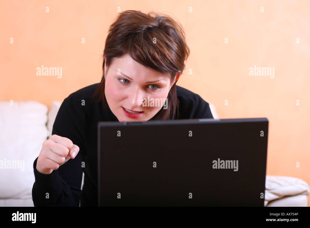Young lady with a computer problem Stock Photo - Alamy
