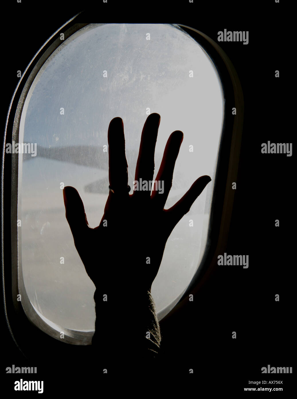 hand at the window of a plane Stock Photo - Alamy