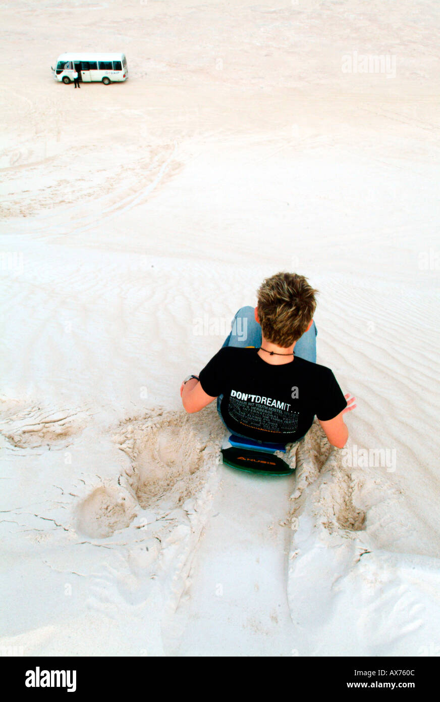 Sandboarding on the lancelin dunes Western Australia Stock Photo - Alamy