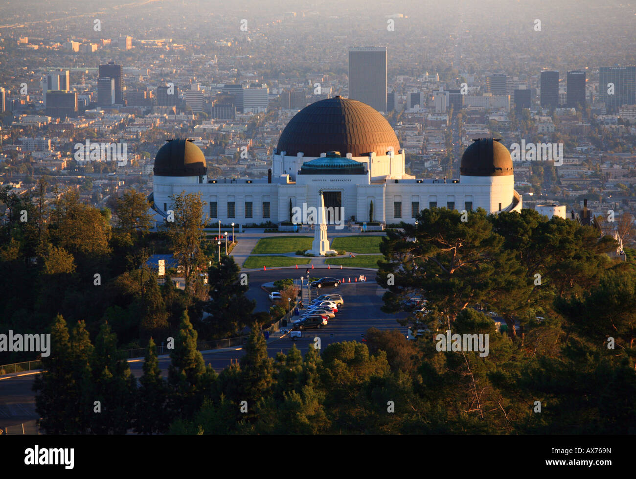 Griffith Observatory and the Los Angeles skyline at sunset Stock Photo ...