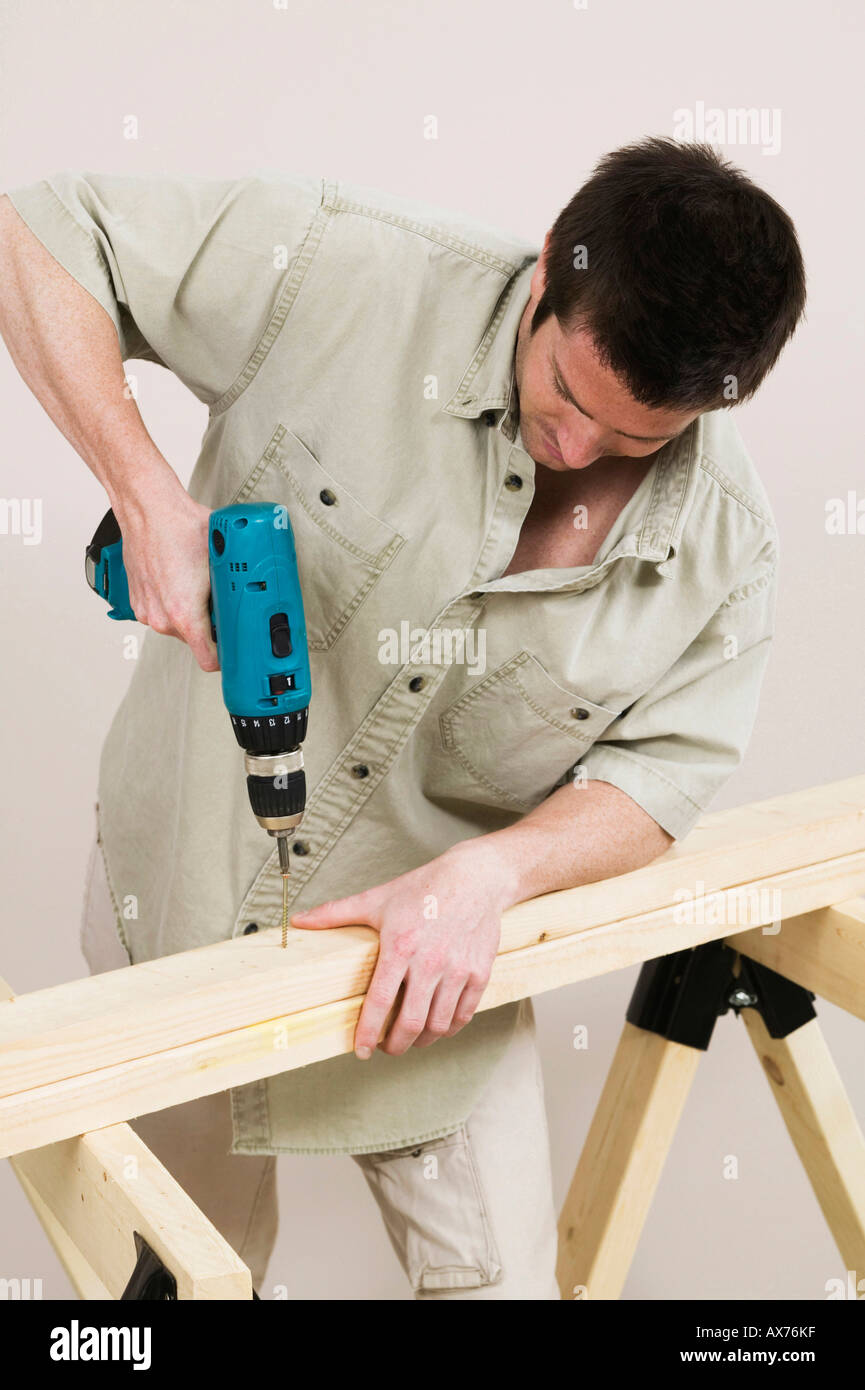 Plank wall drilling hi-res stock photography and images - Alamy