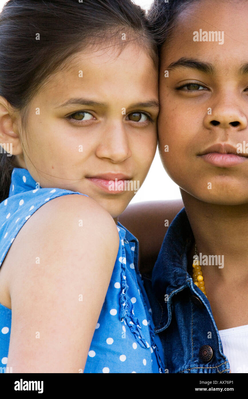 Portrait of two girls staring Stock Photo - Alamy