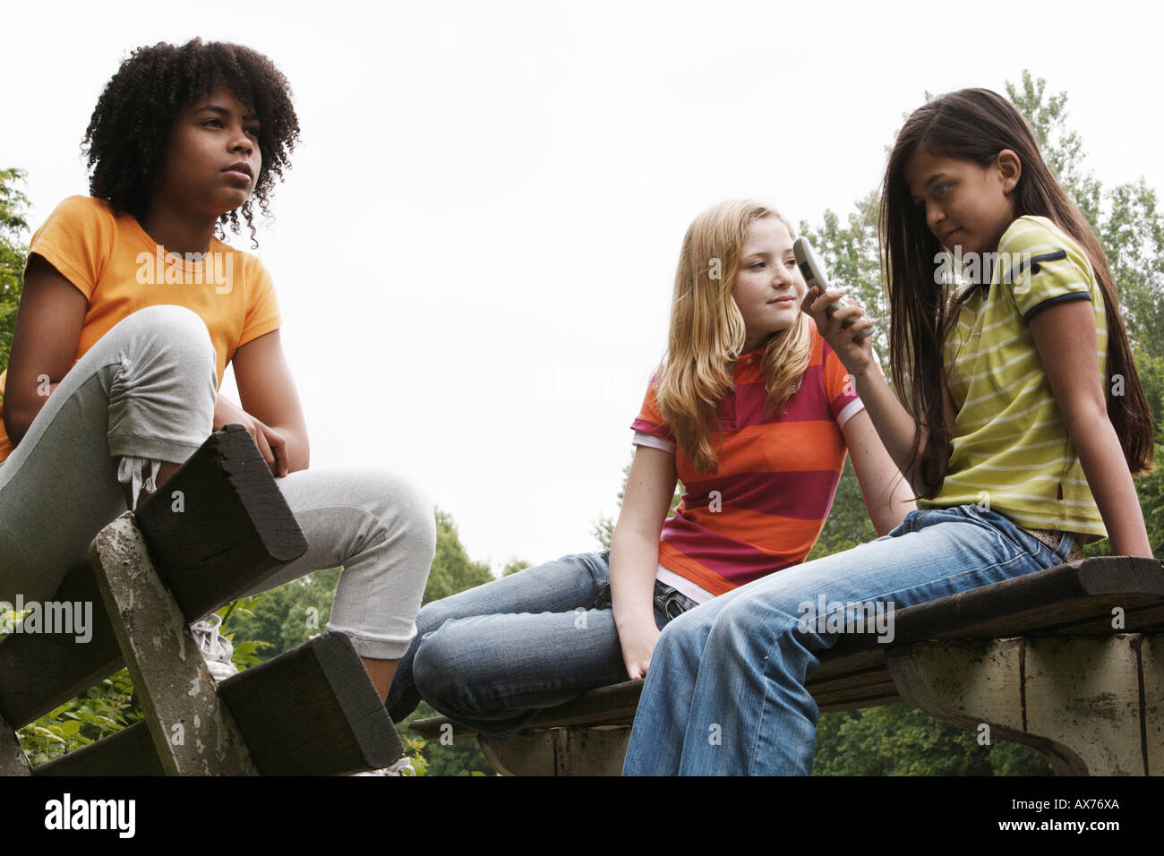 Group people sitting on benches hi-res stock photography and images - Alamy