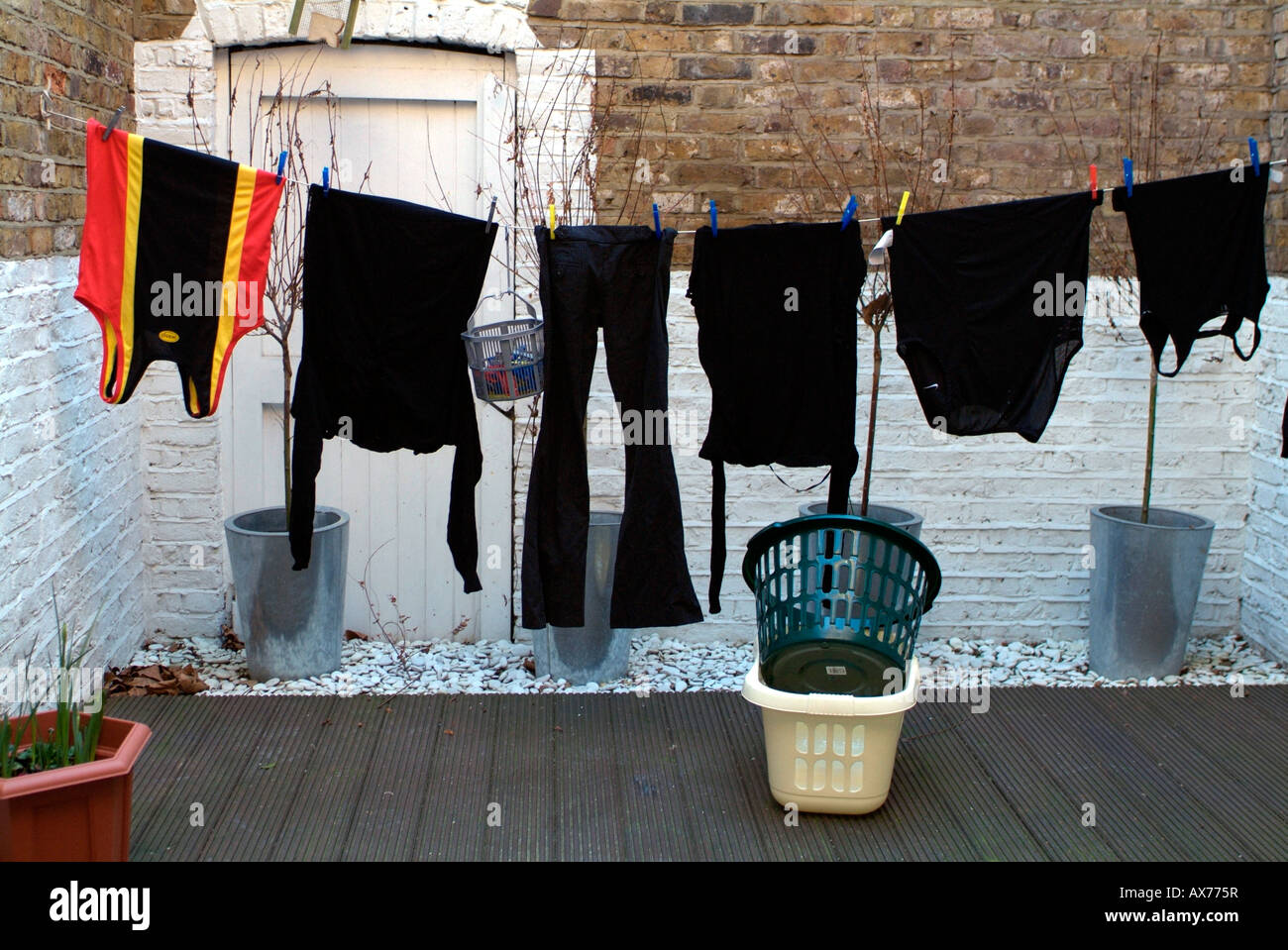 laundry hanging out to dry on washing line Stock Photo - Alamy