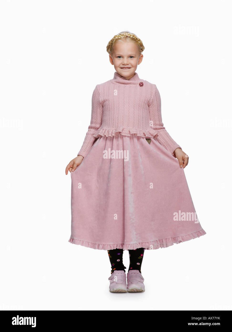 Blond girl (6-8) in a dress, portrait Stock Photo - Alamy