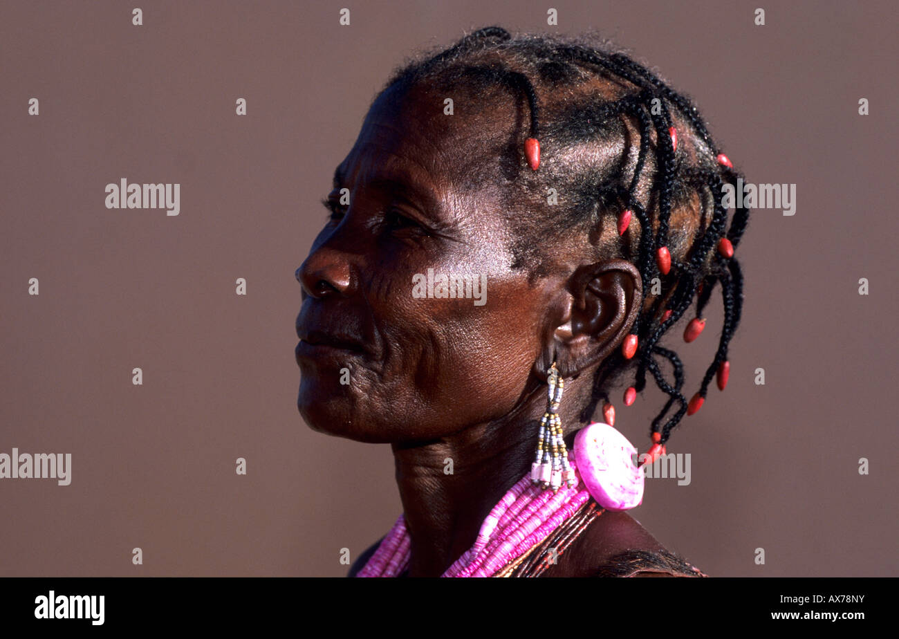 Portrait of Ovambo Woman in Northern Namibia, traditional hair style ...