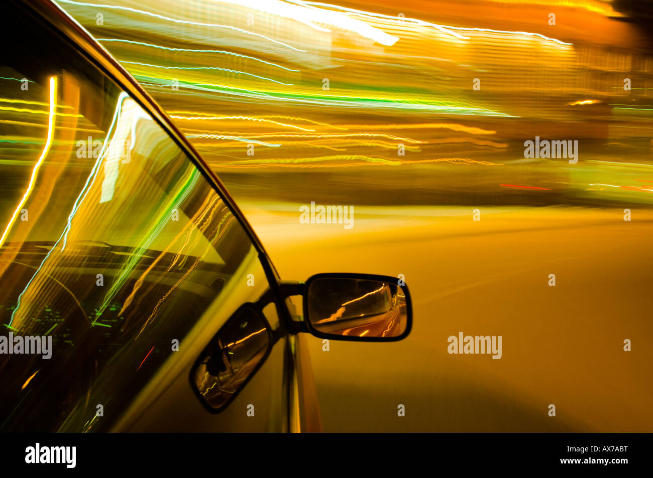 driving at night showing blurred streaks of lights in slow motion ...