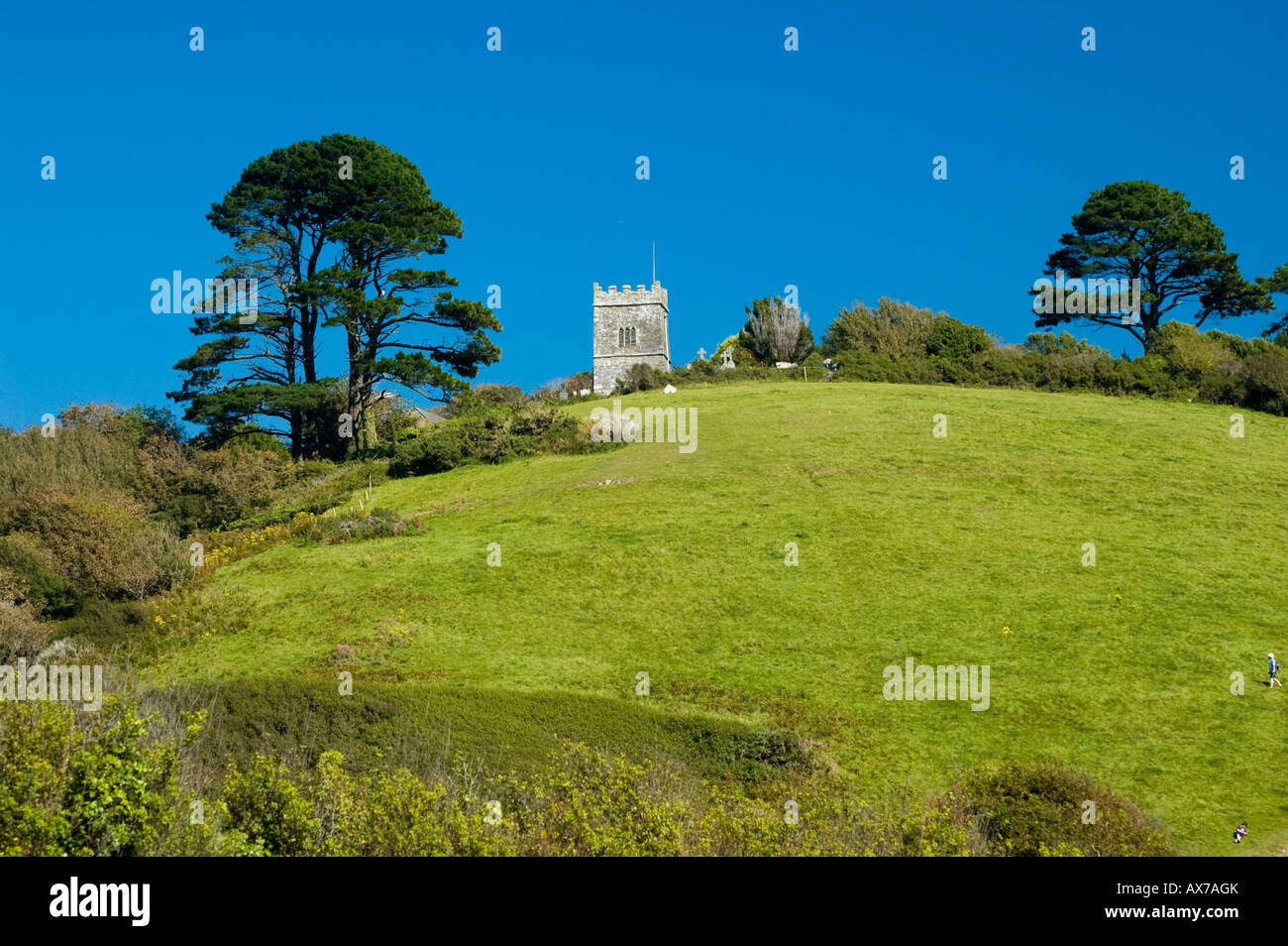 Landscape featuring on the horizon the Parish church of St Tallanus ...