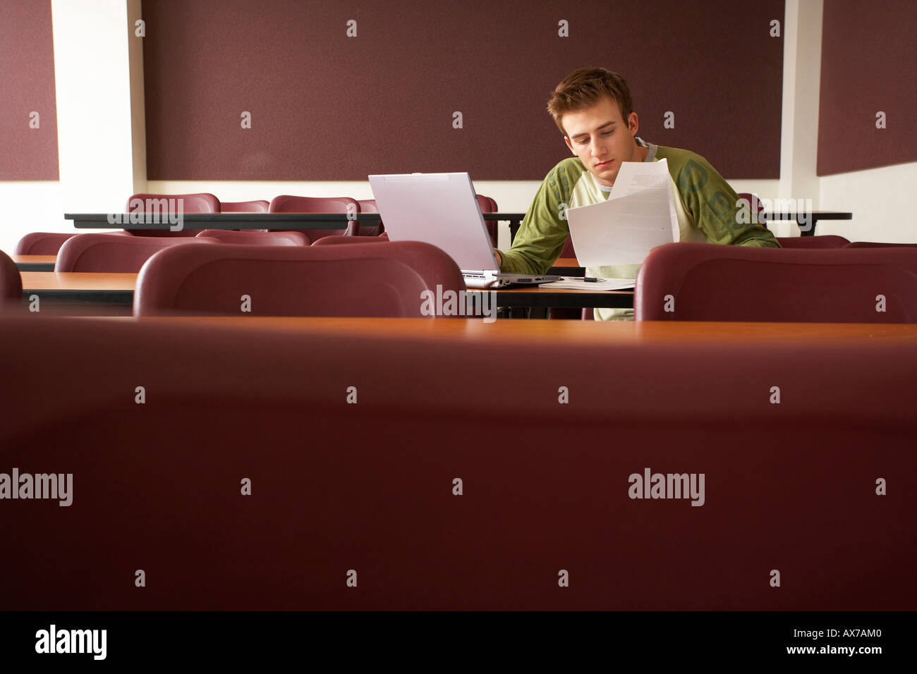 Student sitting lecture hall holding hi-res stock photography and ...