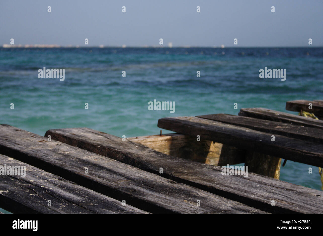 Old dock by the ocean Stock Photo - Alamy