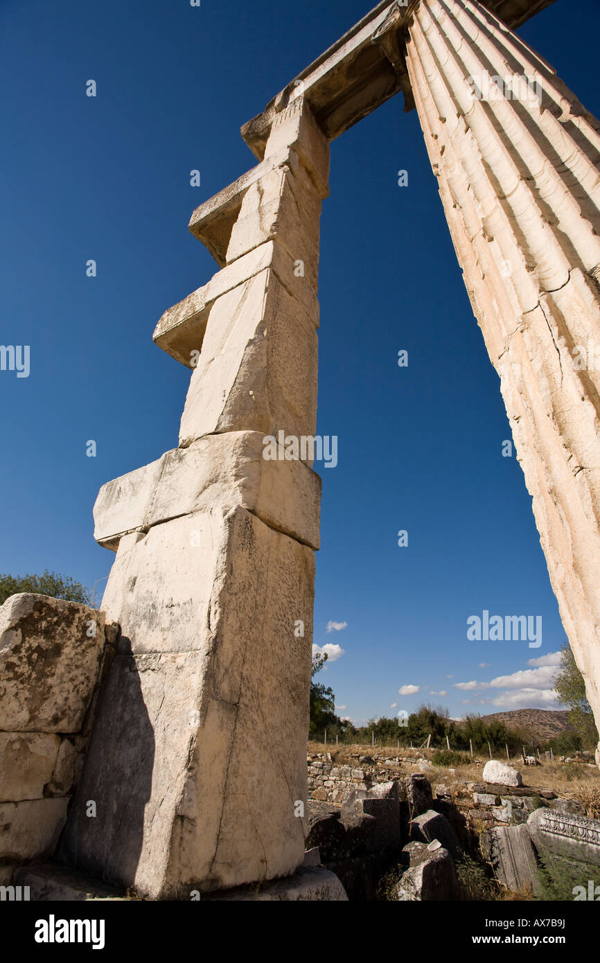 Missing Wall A tall column with lintel and the beginnings of a wall are ...
