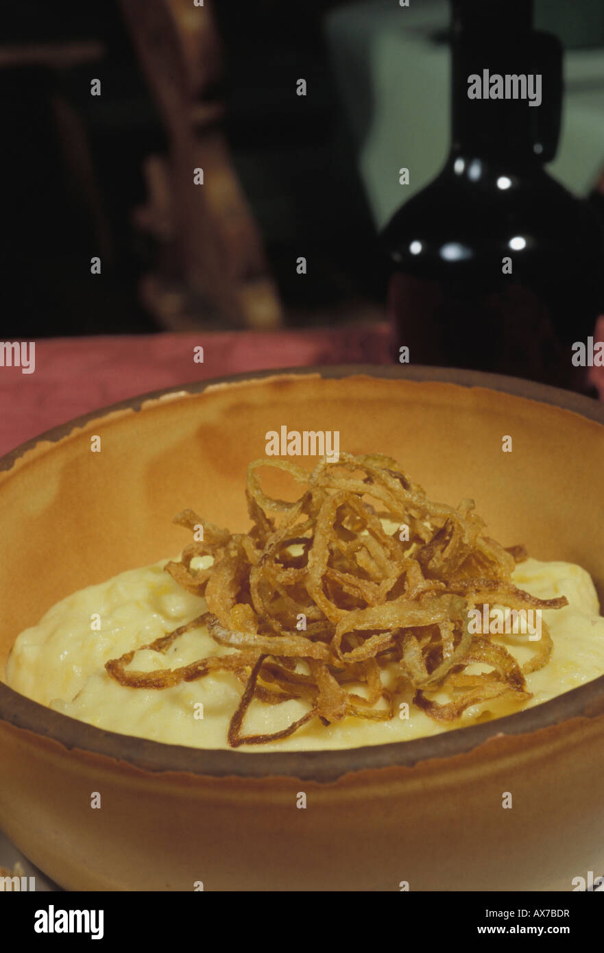 mashed potatoes with roasted onion rings as garnish Stock Photo - Alamy
