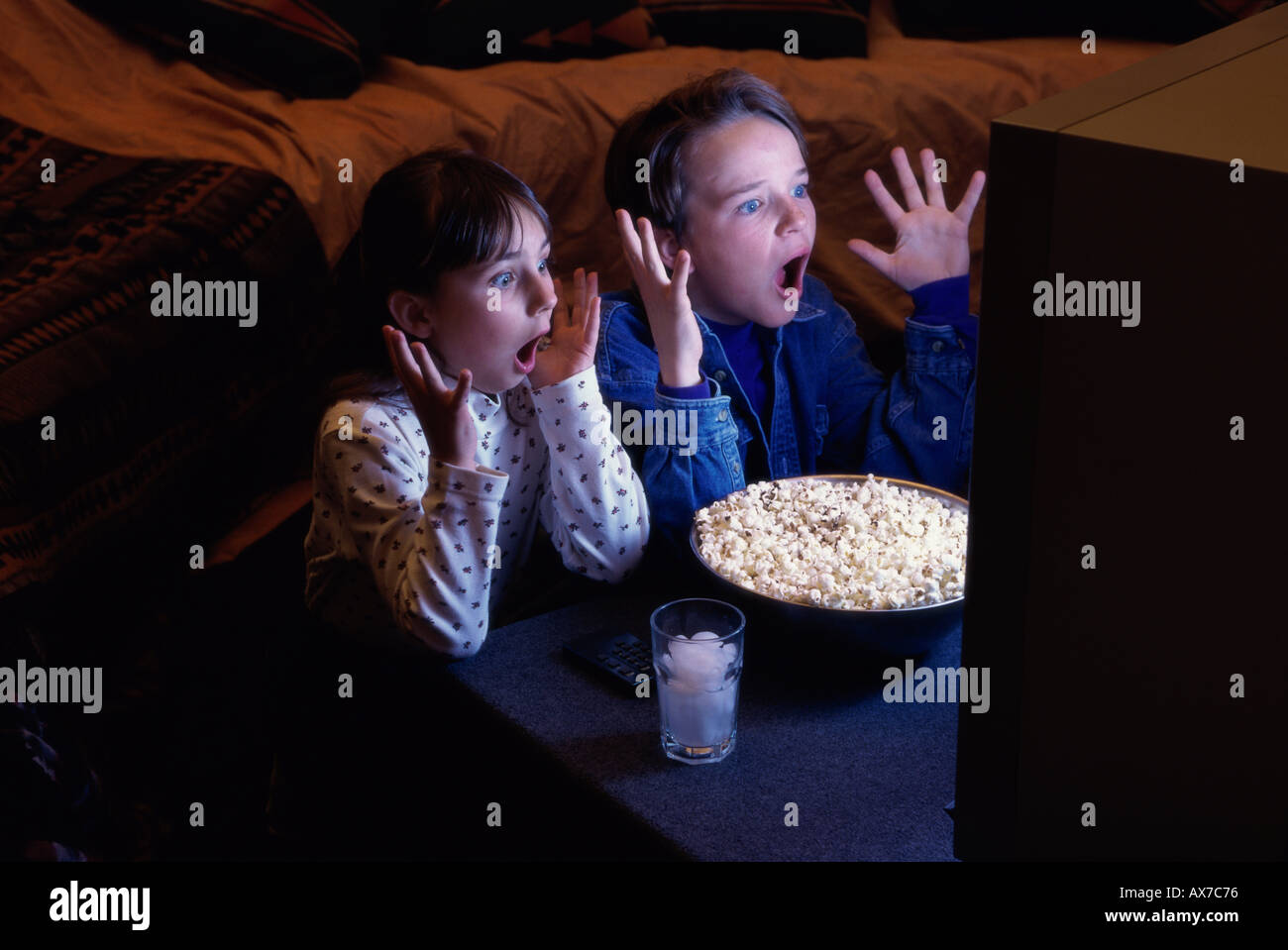 Scared children watching tv hi-res stock photography and images - Alamy