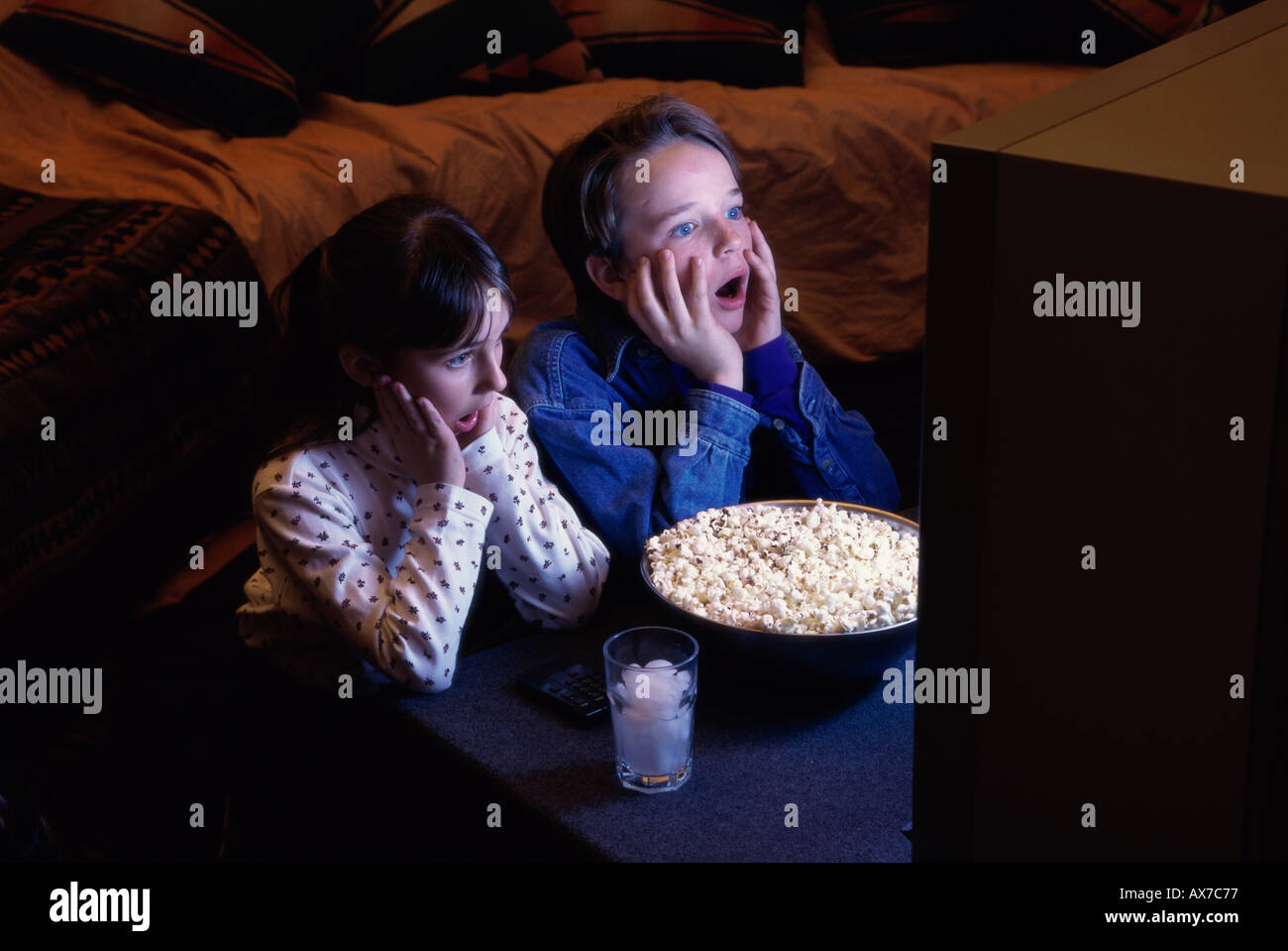 Scared children watching tv hi-res stock photography and images - Alamy