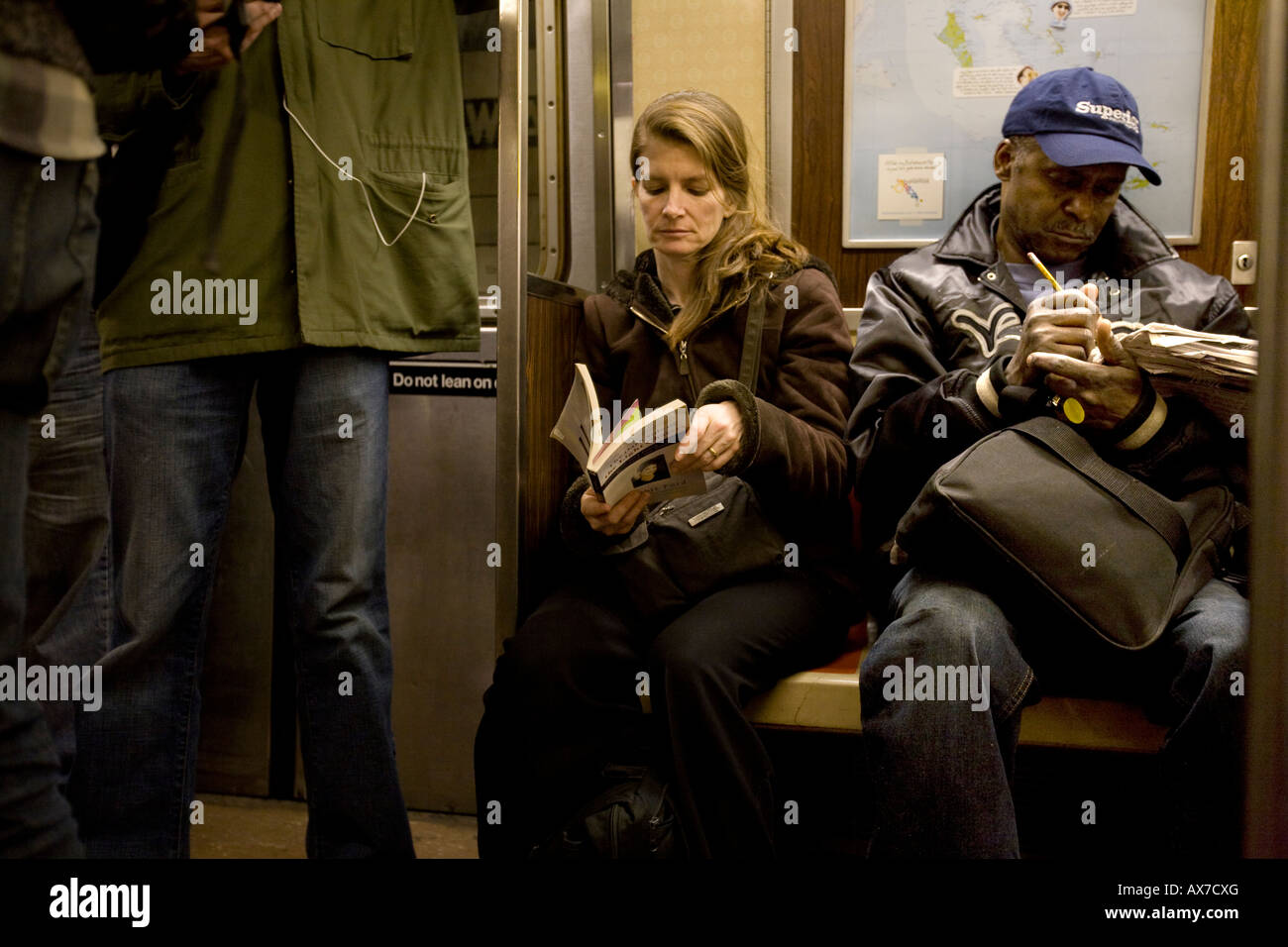 Subway riders in New York City Stock Photo - Alamy