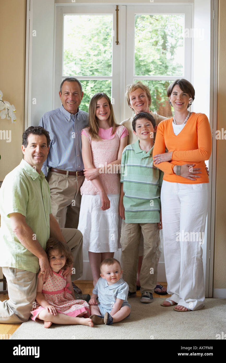 Three generation family smiling Stock Photo - Alamy