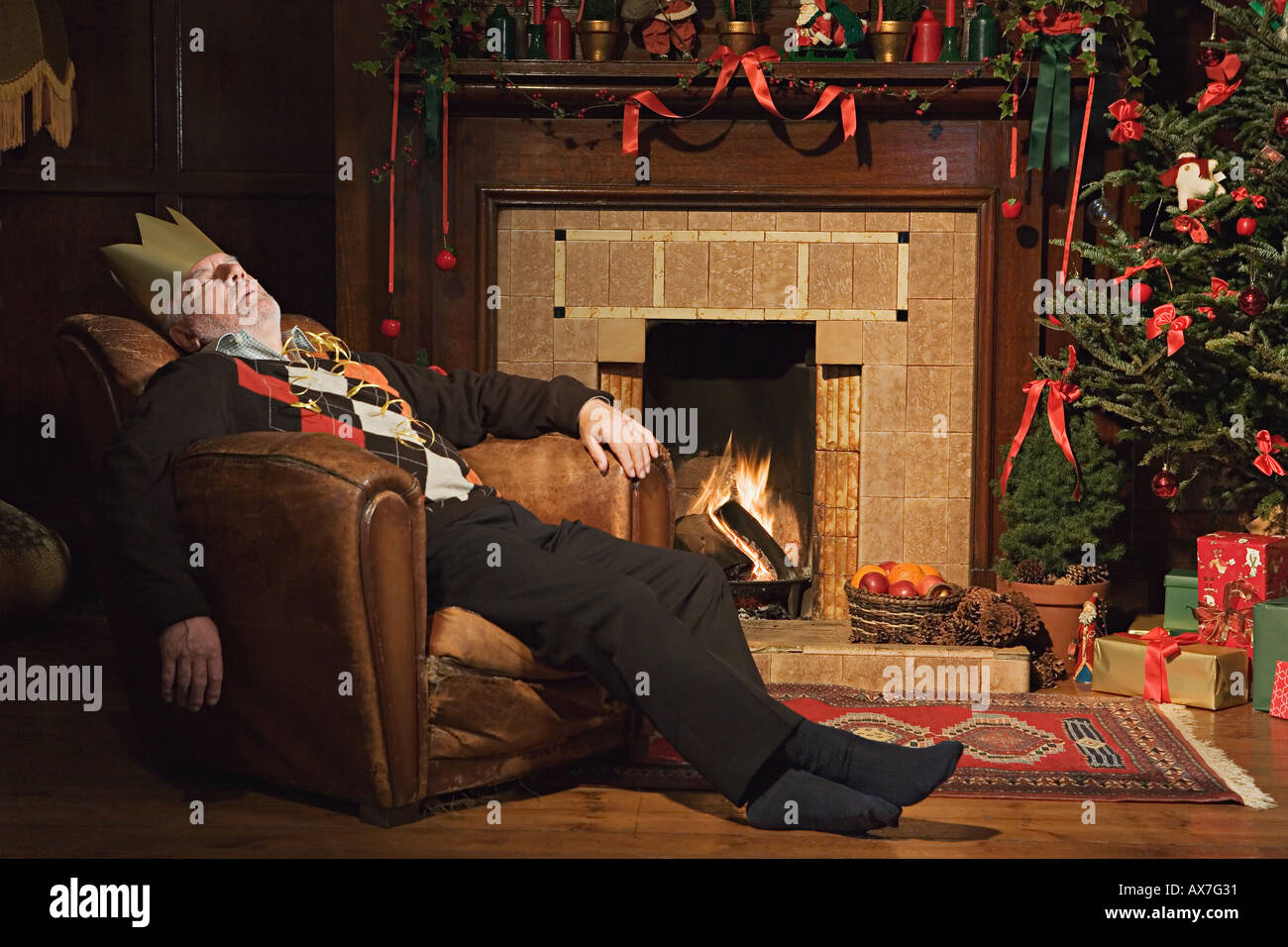 Elderly People Sitting By Fireplace