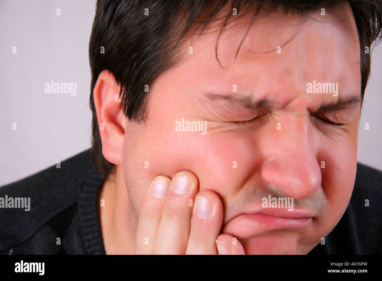 Toothache (man in agony Stock Photo - Alamy