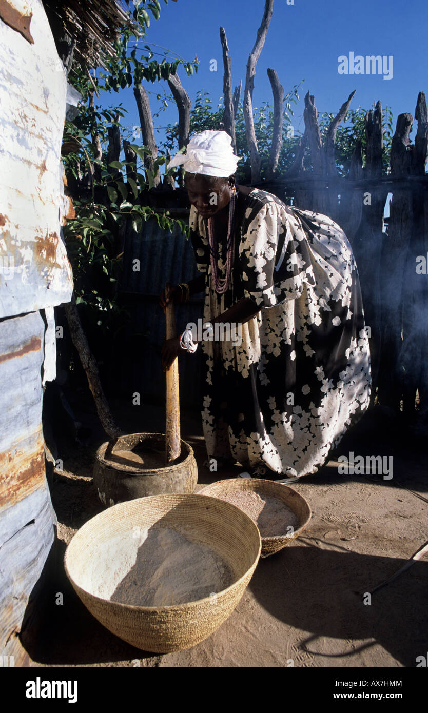 Owambo woman preparing traditional oshifima porridge Namibia Stock ...