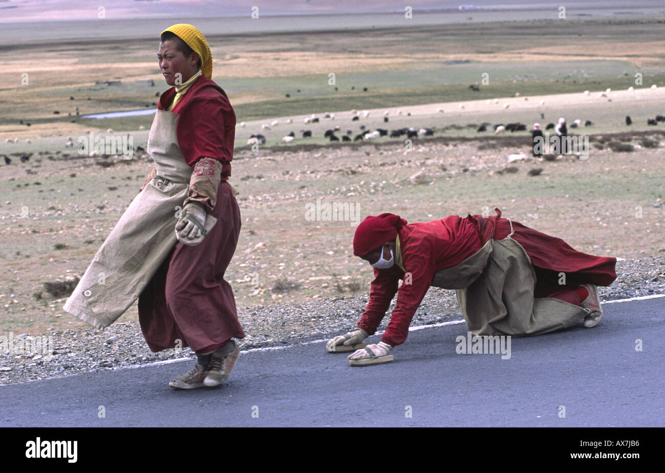 Buddhist pilgrim prostrating on street hi-res stock photography and ...
