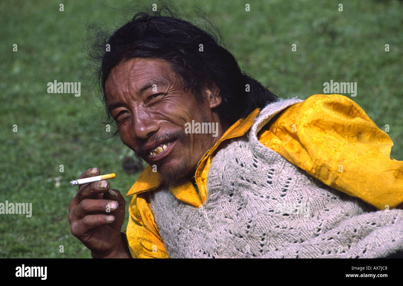 Tibetan man smoking hi-res stock photography and images - Alamy
