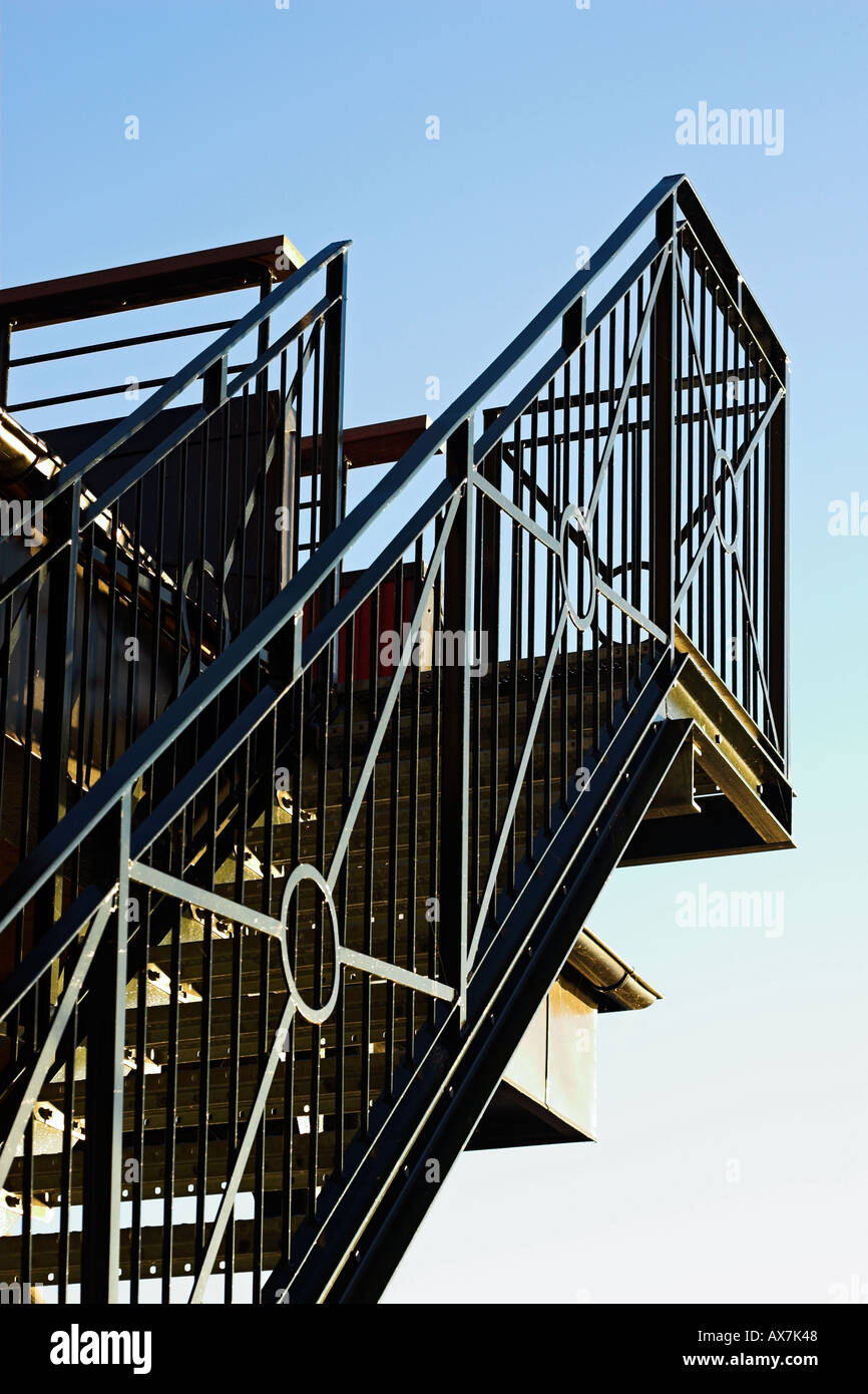 Stairs with metal handrail hanging design Stock Photo - Alamy