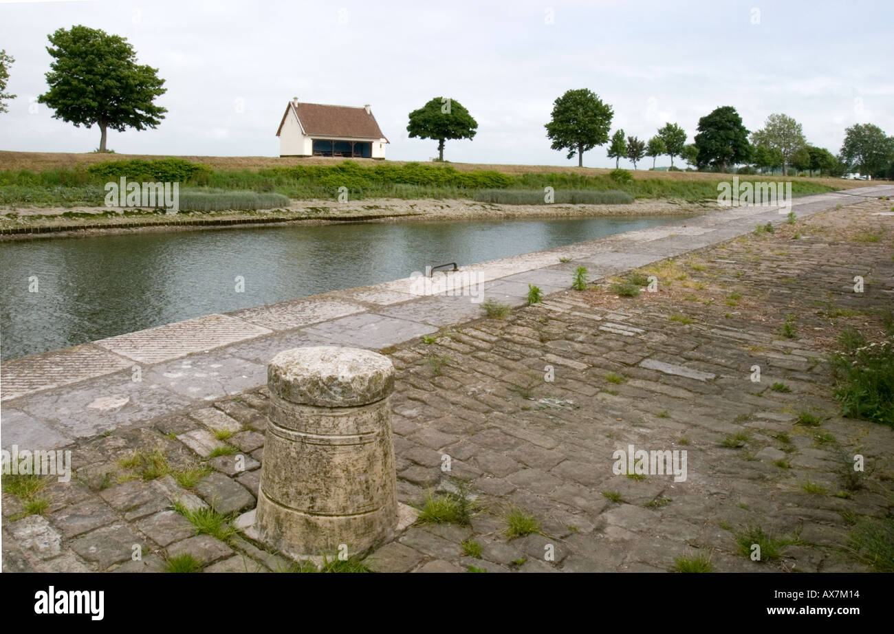 Quayside view across estuary of River Somme with capstan at St Valery ...